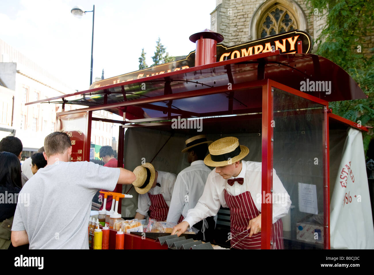 Market stall traders in Cambridge Stock Photo - Alamy