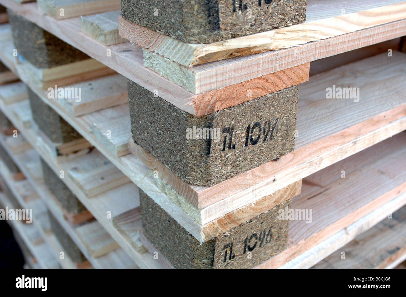 Manufacture and distribution of wooden pallets Stock Photo - Alamy