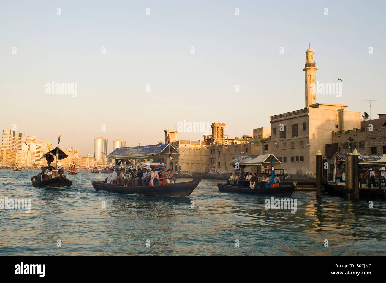 Abras approaching the lower abra station on Dubai Creek, UAE Stock ...