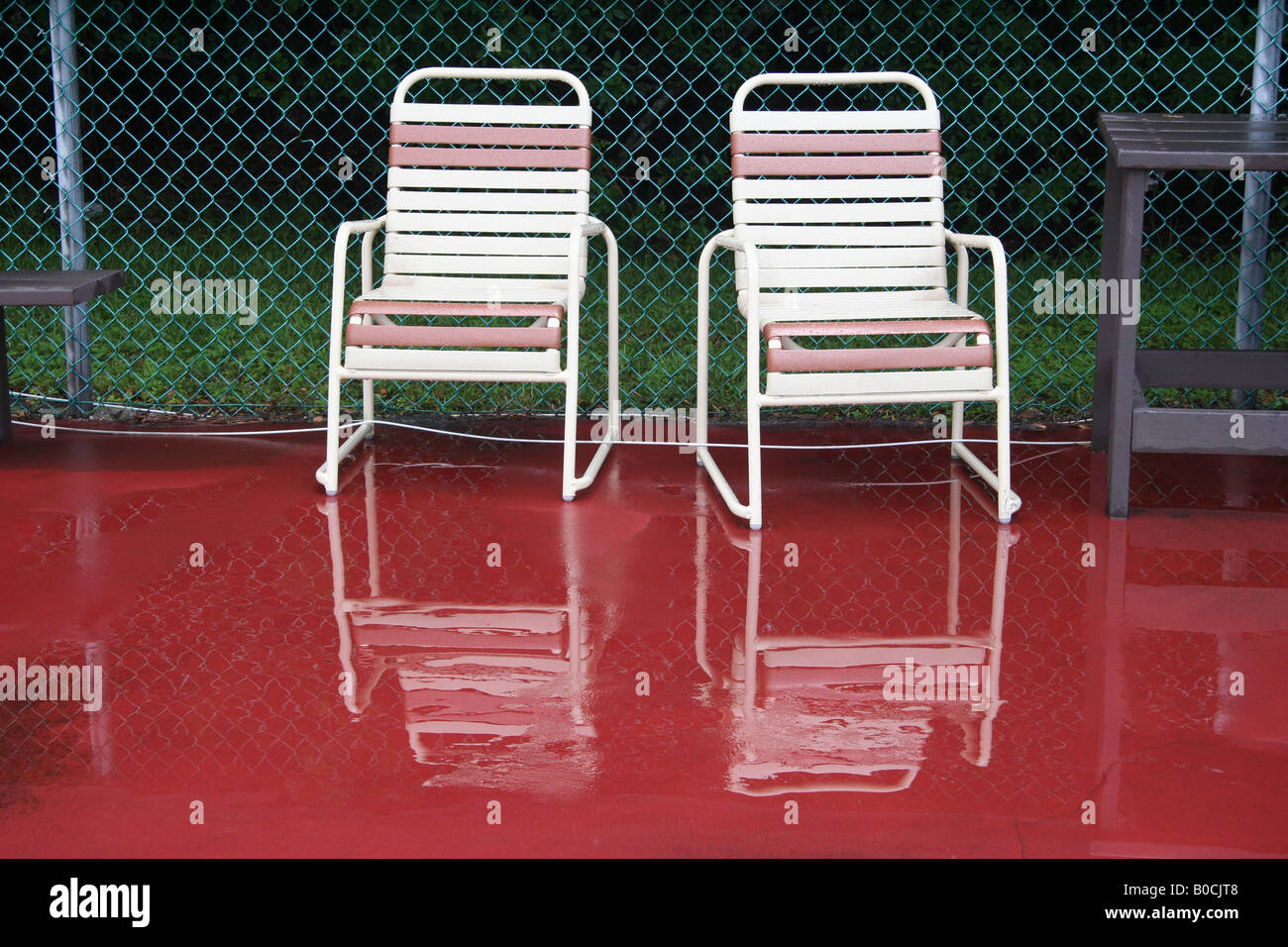 Empty chairs in rain storm hi-res stock photography and images - Alamy