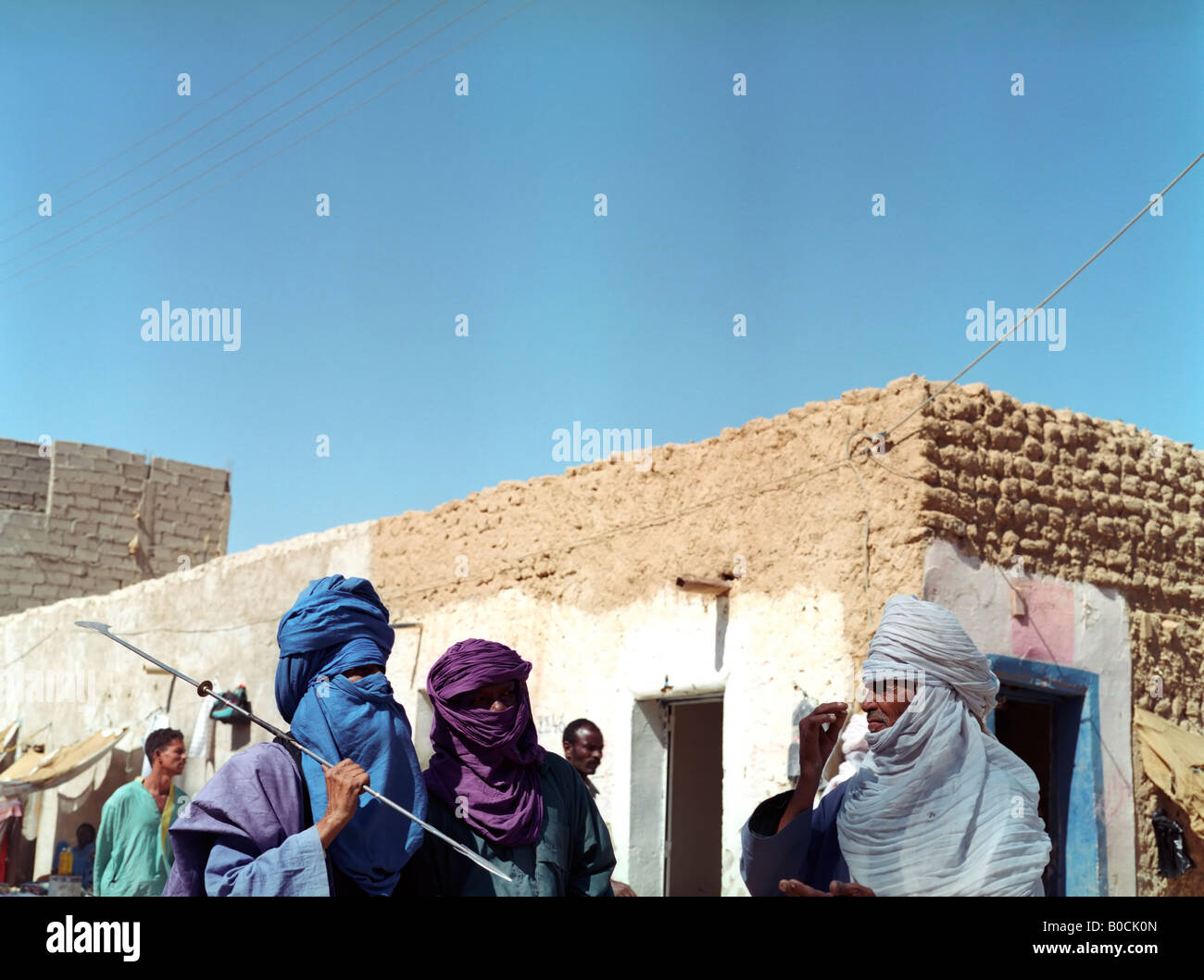 Tuareg men shopping on a market in Tamanrasset Stock Photo - Alamy
