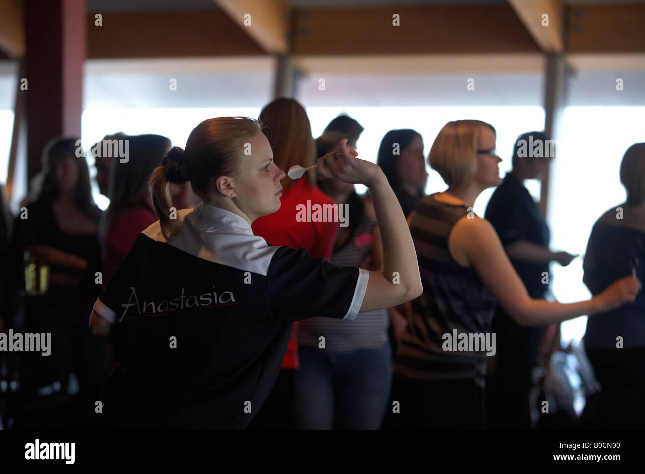 Ladies darts champion Anastasia Dobromyslova concentrates on throwing ...