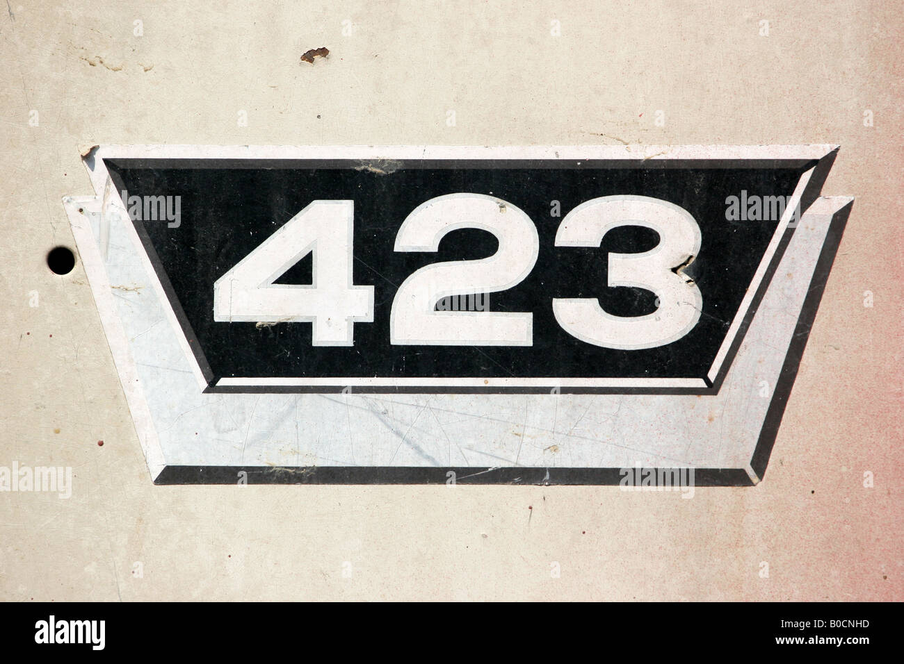 Number 423 sign with white figures on black background Stock Photo - Alamy