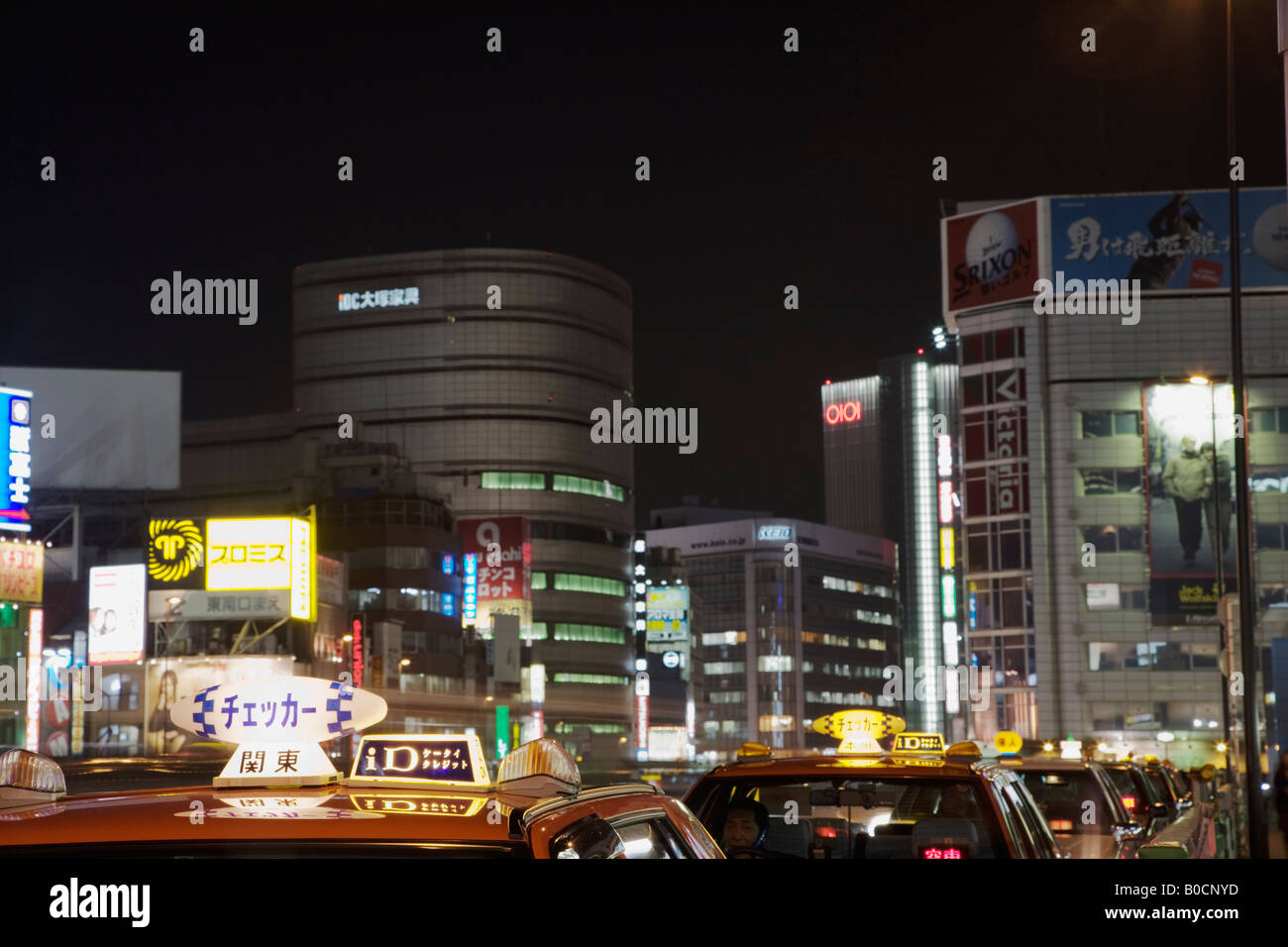 A queue of taxicabs along Koshu kaido Avenue at the south exit of ...
