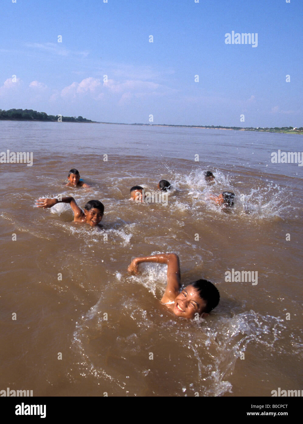 Children playing in mekong river hi-res stock photography and images ...