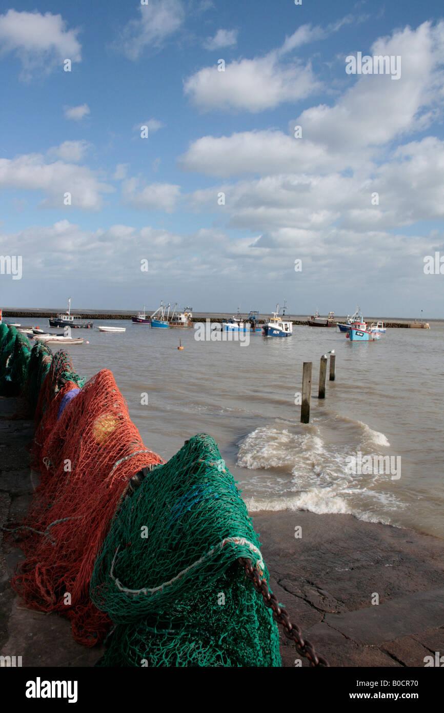 fishing nets drying over railings at Folkestone harbour Stock Photo - Alamy