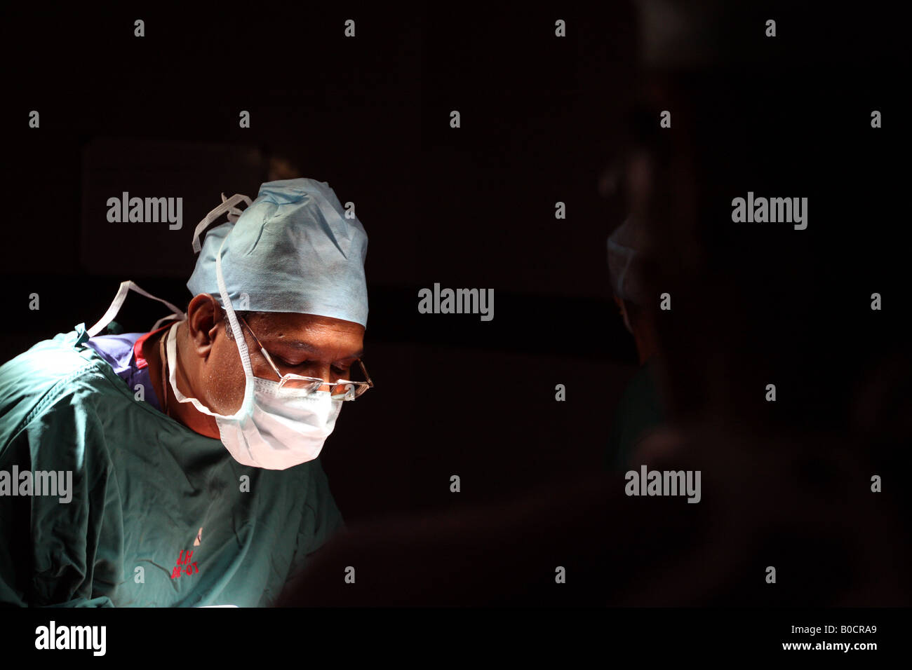 Surgeon performing surgery in an operation theatre in India Stock Photo ...