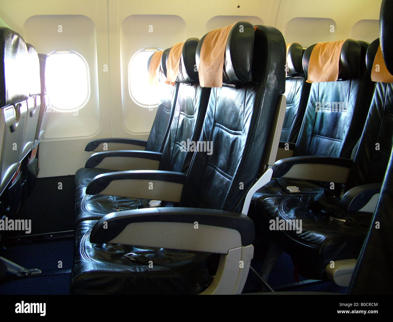 Airline seats armrest hi-res stock photography and images - Alamy