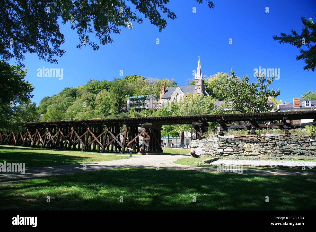 Raised railroad track leading into Harpers Ferry, West Virginia Stock ...