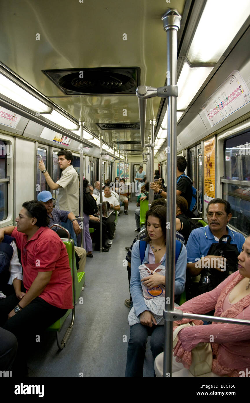 Inside busy underground train in Mexico City Stock Photo - Alamy
