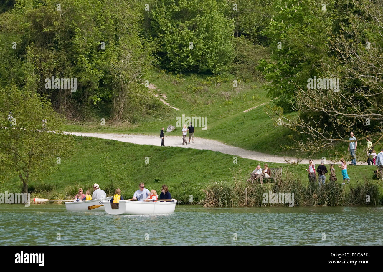 Families enjoying boating on Swanbourne Lake, Arundel, Sussex, England ...