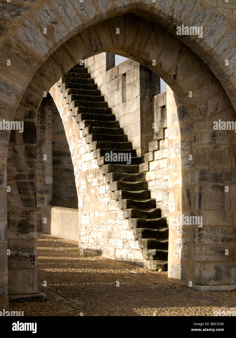 Steps through the archway Stock Photo - Alamy