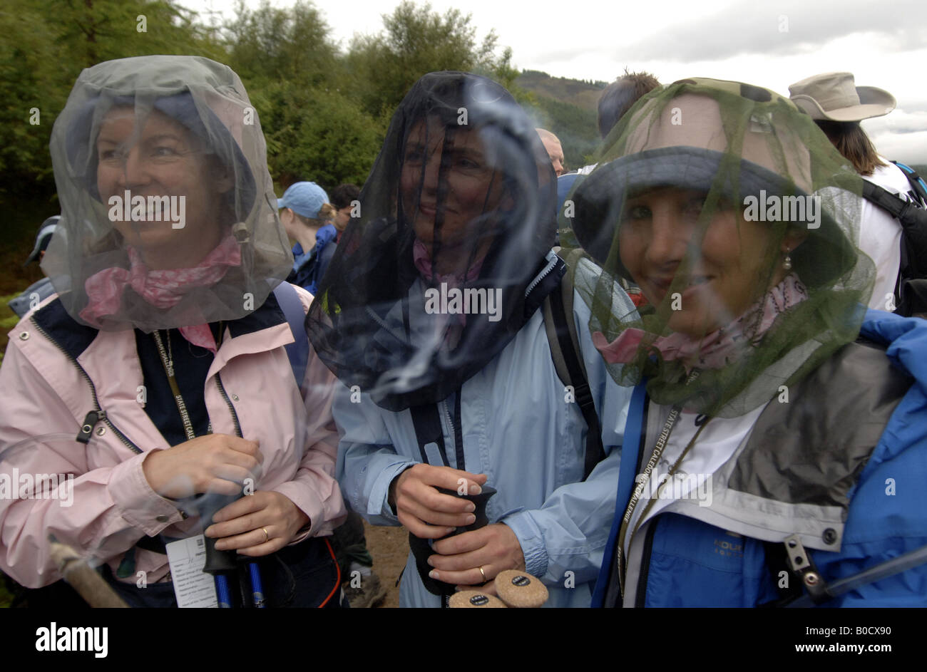 Walkers in the Scottish Highlands wearing Midge Nets to protect them ...