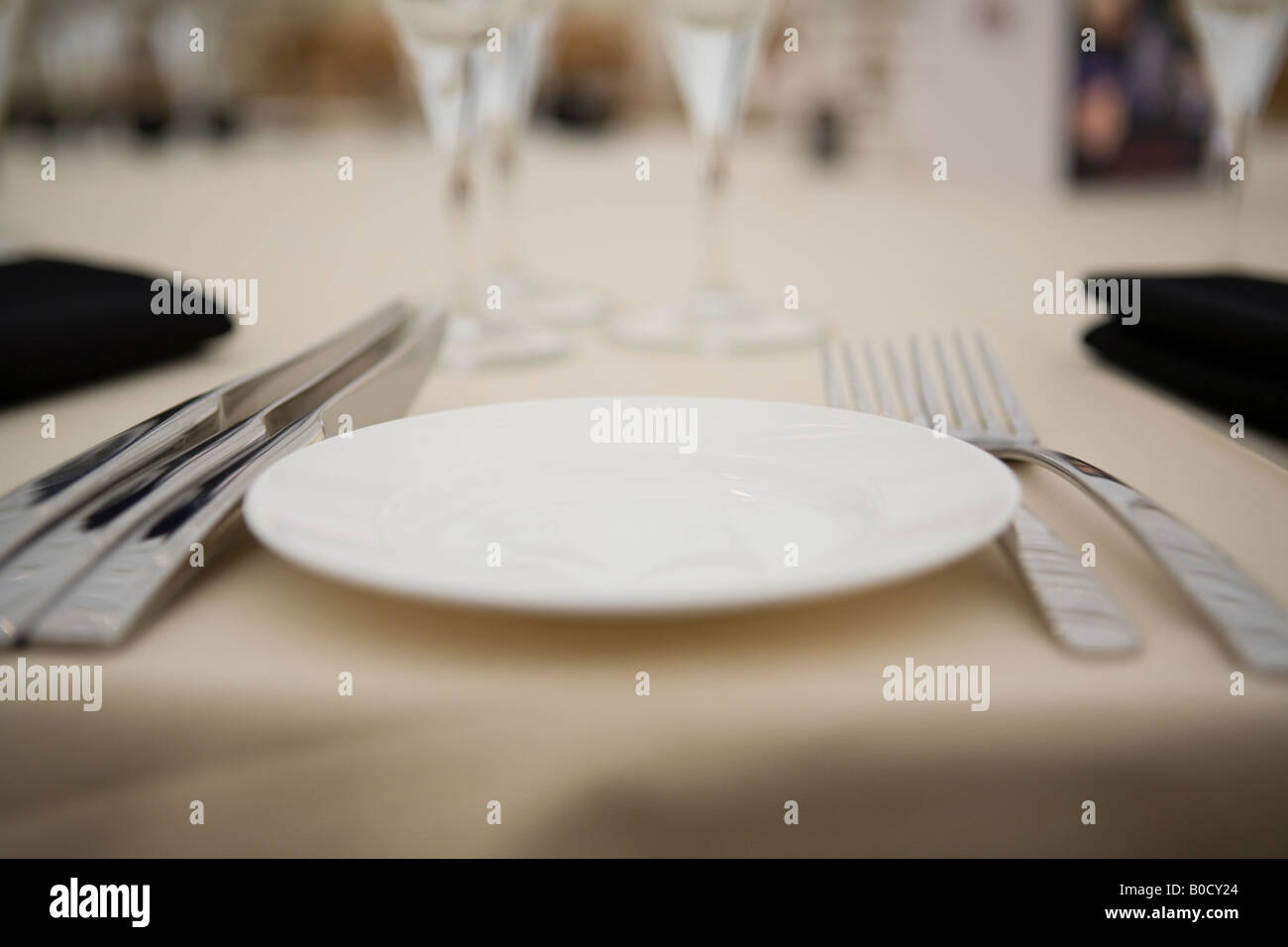 colour image and a close up off a table setting and a place ready for ...