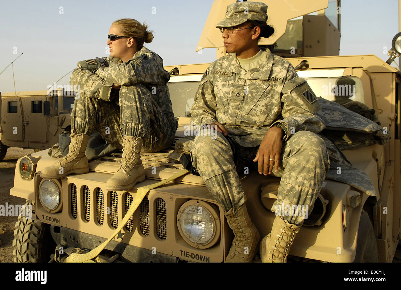 Two soldiers sitting hi-res stock photography and images - Alamy
