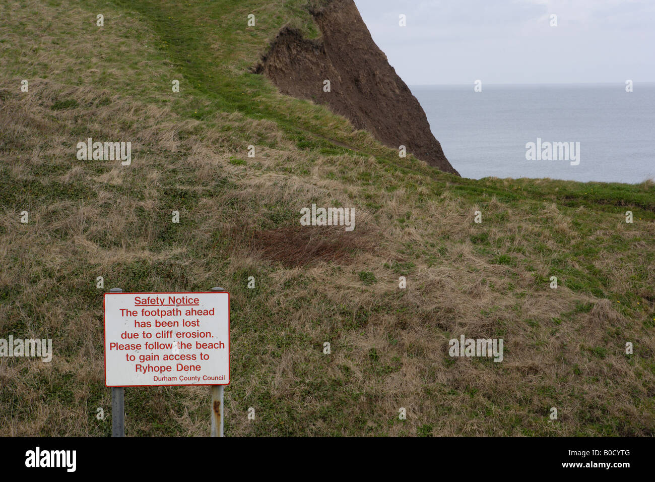 Cliff erosion warning sign, Ryhope Dene Stock Photo - Alamy