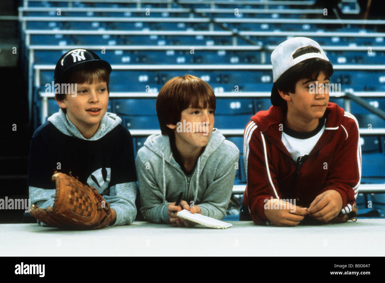 USA New York City The Bronx Yankee Stadium Three young Yankee fans ...