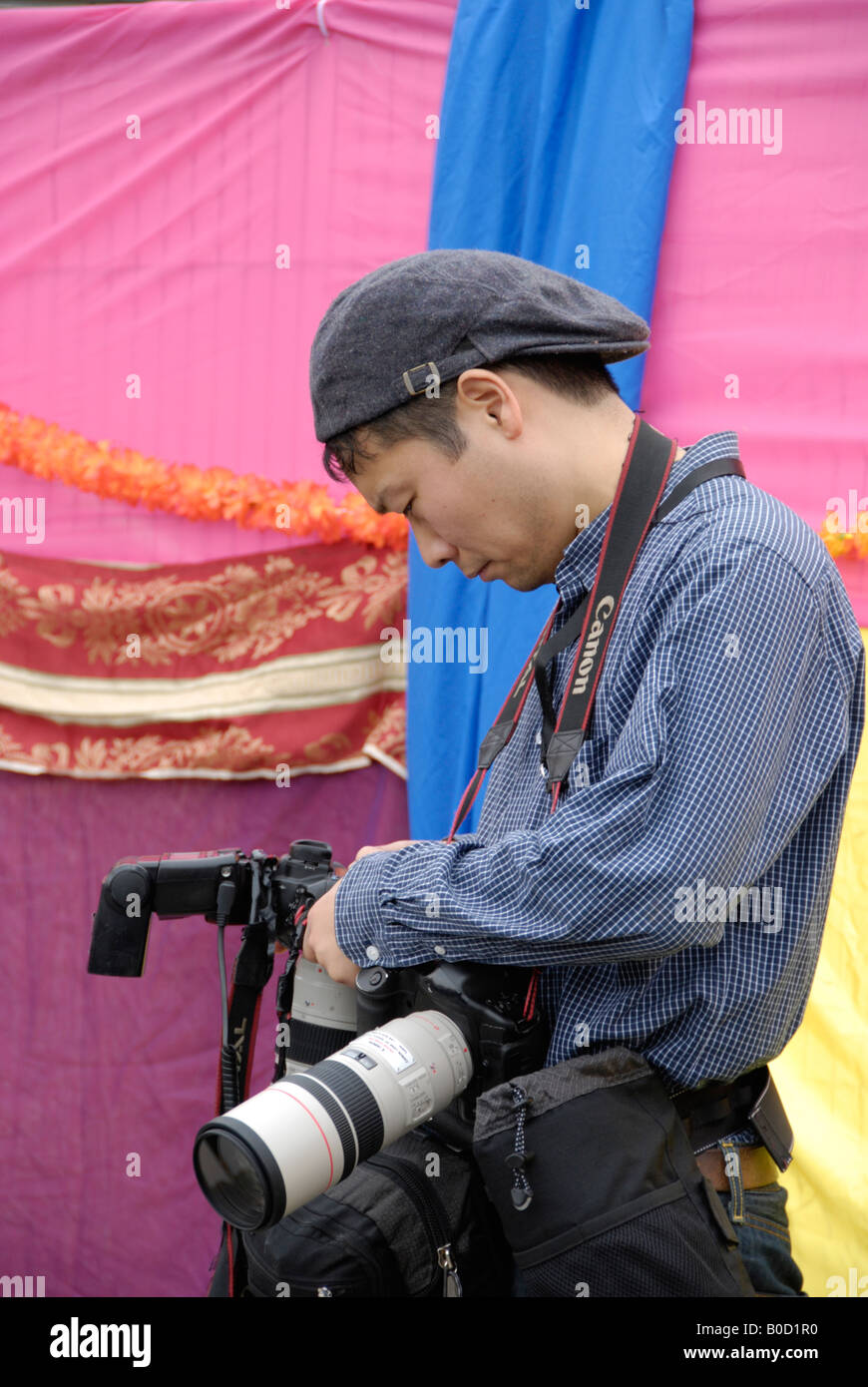 Checking the camera hi-res stock photography and images - Alamy