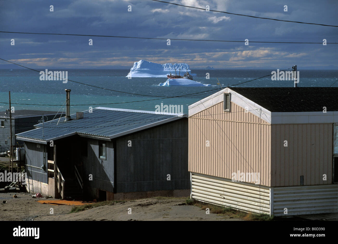 Pond Inlet floating iceberg passing Bylot island Stock Photo - Alamy