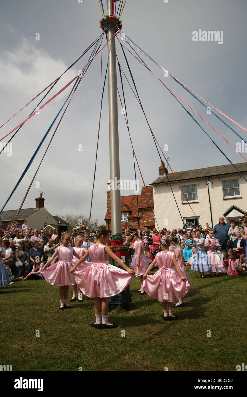 Dance around maypole traditional costume hi-res stock photography and ...