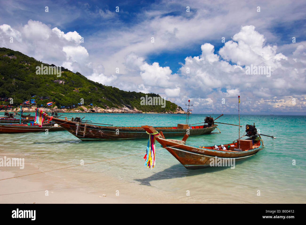 Longtail boats at Haad Rin beach on Ko Phangan island, Thailand Stock ...