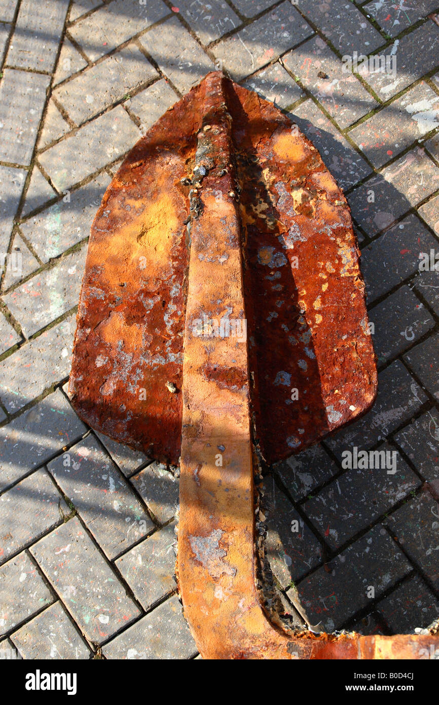 Rusting anchor fluke on the quayside in the historic city of Kings Lynn ...
