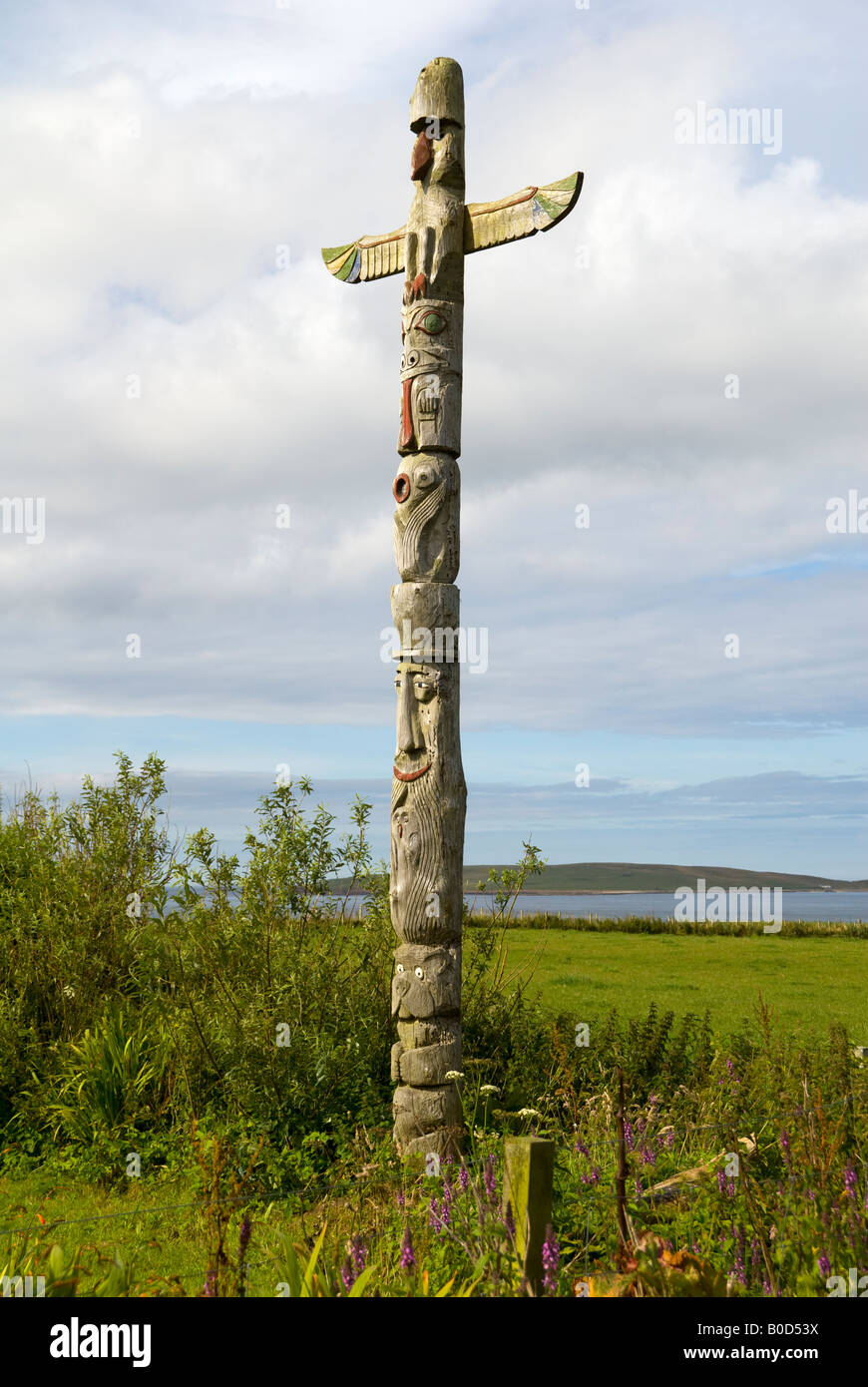 Detail from a Totem Pole in a garden at Evie, Mainland, Orkney Islands ...