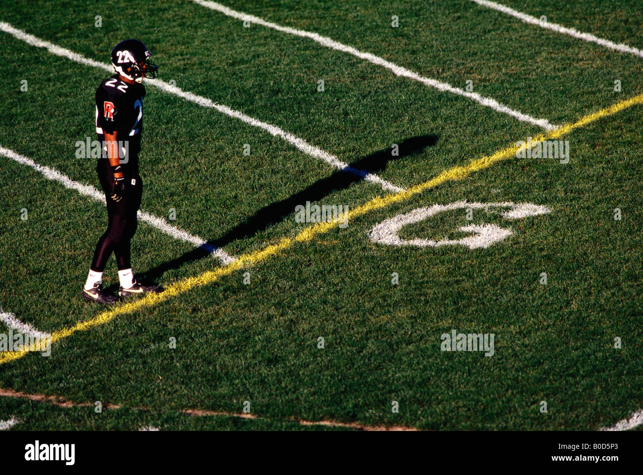 Football player standing at the goal line Stock Photo - Alamy