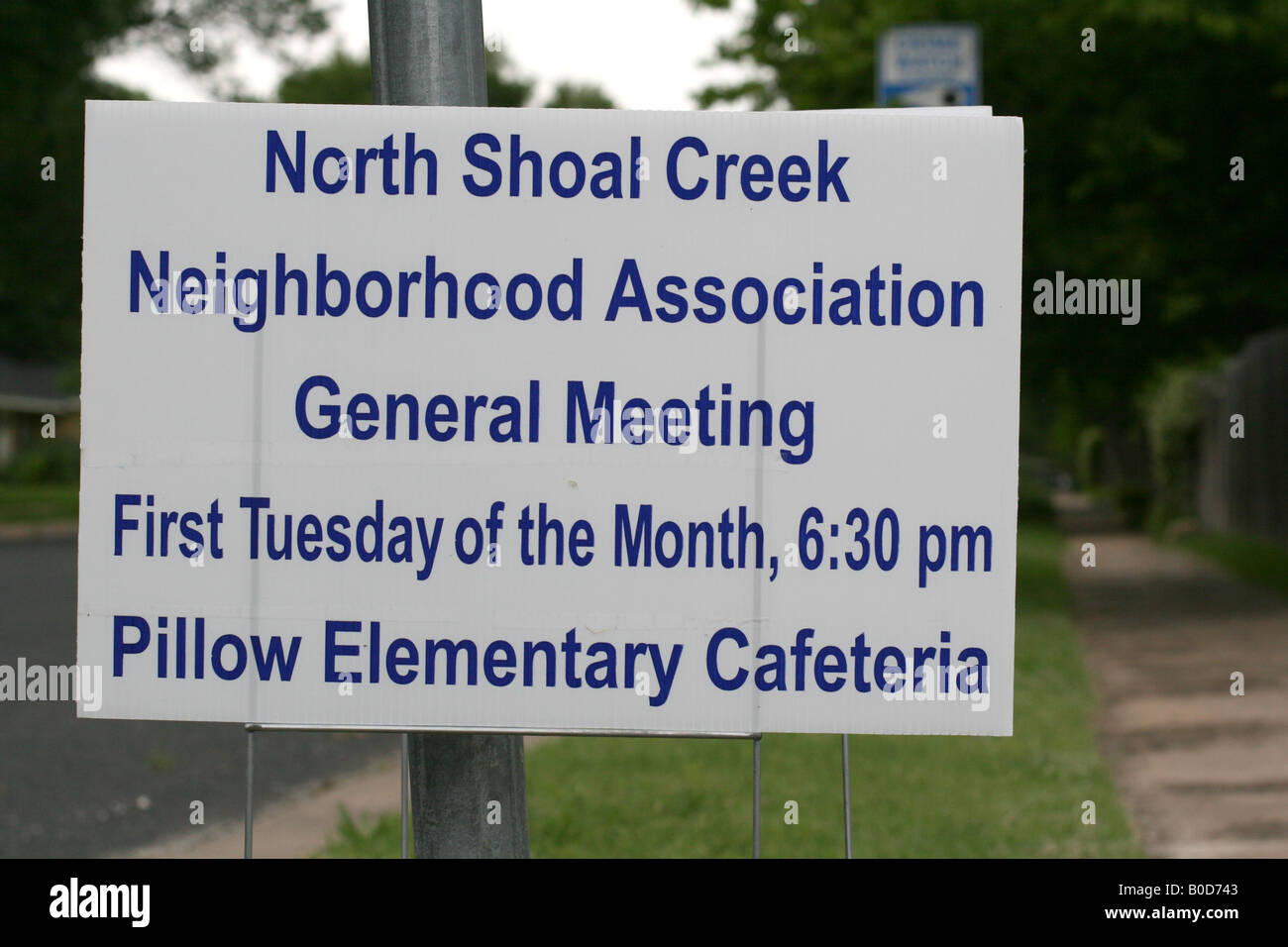 Sign announcing neighborhood association meeting Stock Photo - Alamy