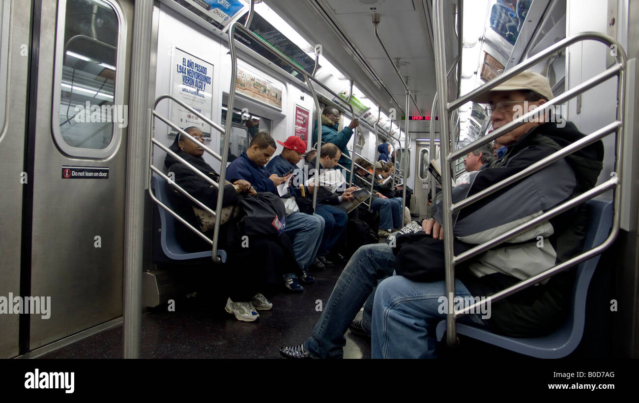 Commutors inside a subway train in New York city Stock Photo - Alamy