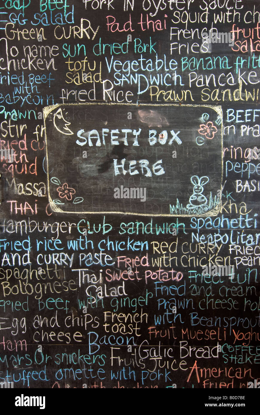 A fun sign and menu at a restaurant in Southern Thailand Stock Photo ...