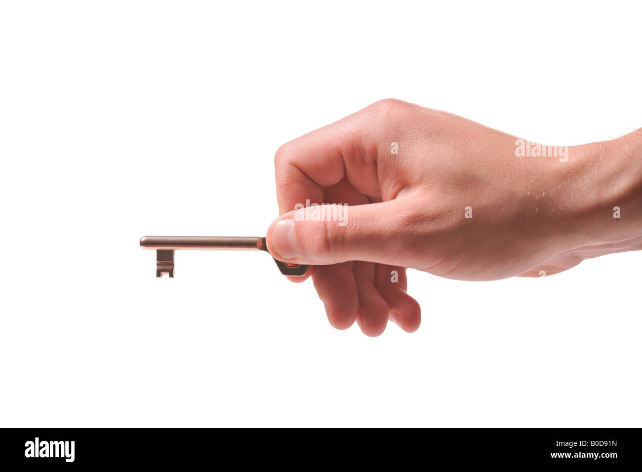 Person holding a door key Stock Photo - Alamy