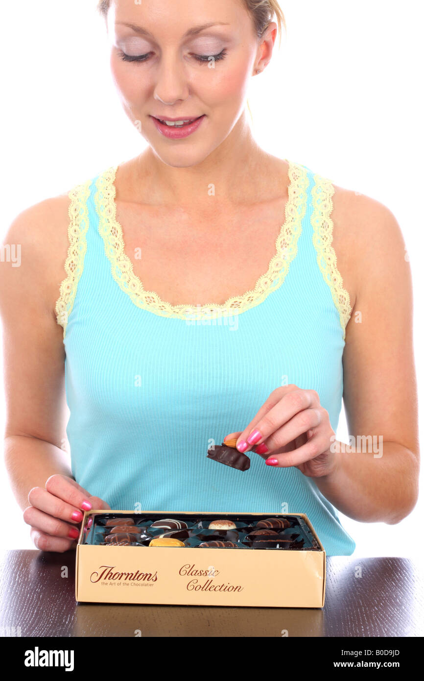Young Woman Choosing Chocolates Model Released Stock Photo - Alamy