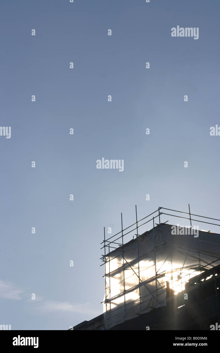 Scaffolding on top of Building Stock Photo - Alamy