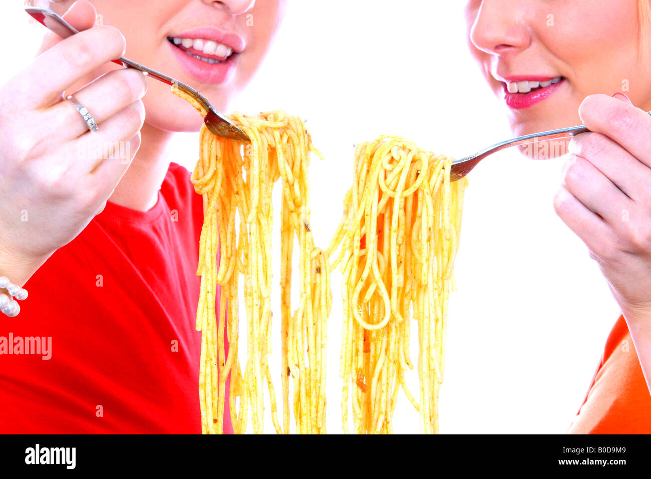 Italian girls eating pasta hi-res stock photography and images - Alamy
