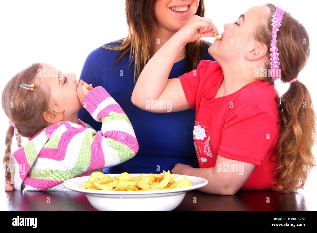 Children Eating Crisps Models Released Stock Photo - Alamy