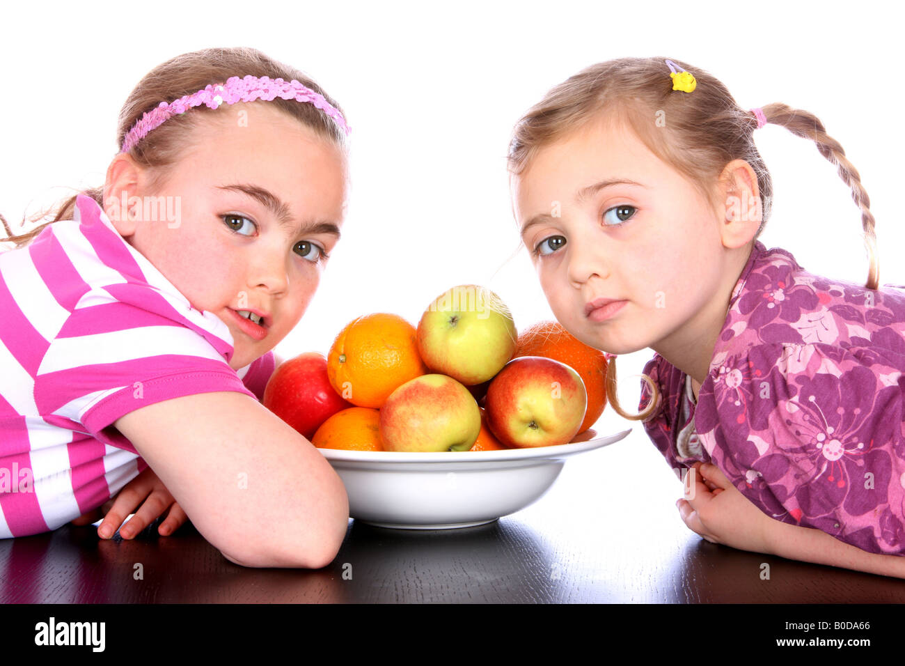 Children with Bowl of Fruit Models Released Stock Photo - Alamy