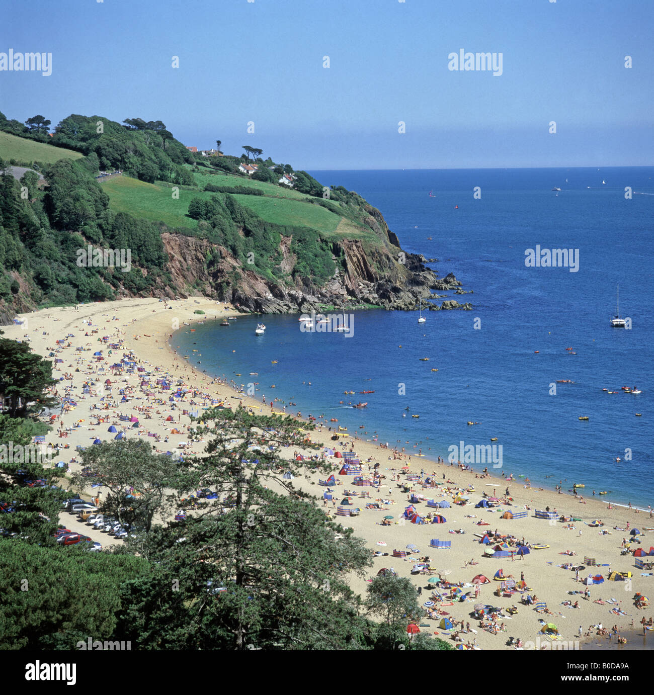 Beach scene with cliffs in Devon Stock Photo - Alamy
