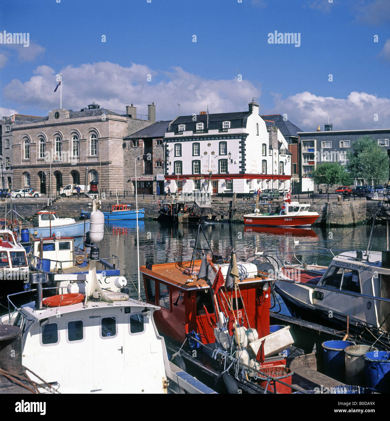 Harbour scene with fishing boats Stock Photo - Alamy