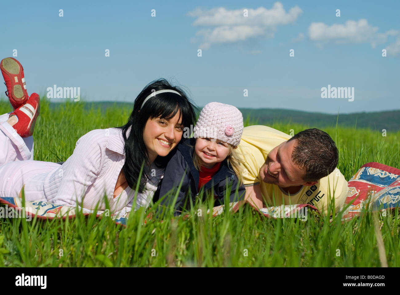 Happy family in nature II Stock Photo - Alamy
