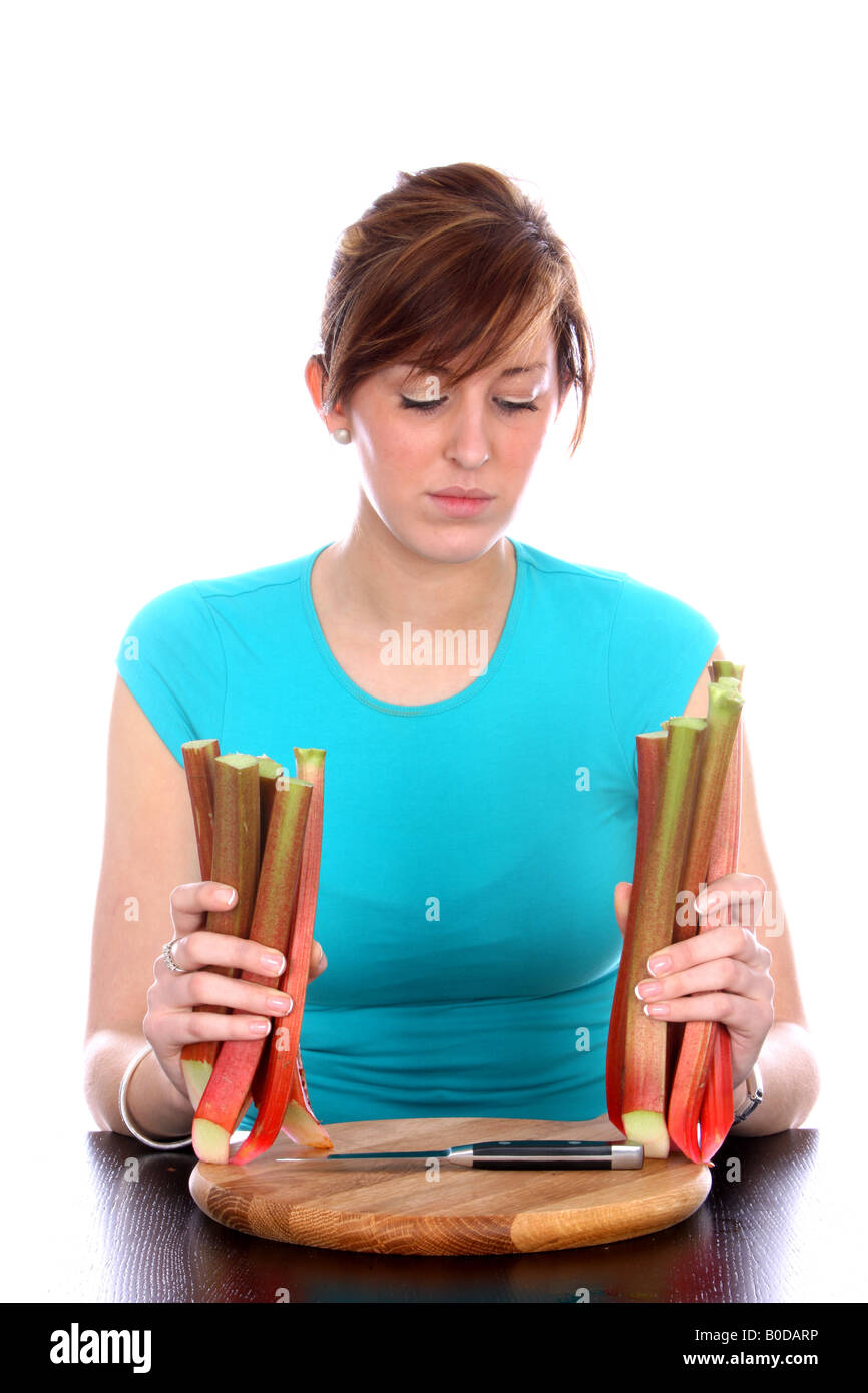 Teenage Girl Preparing Rhubarb Model Released Stock Photo - Alamy