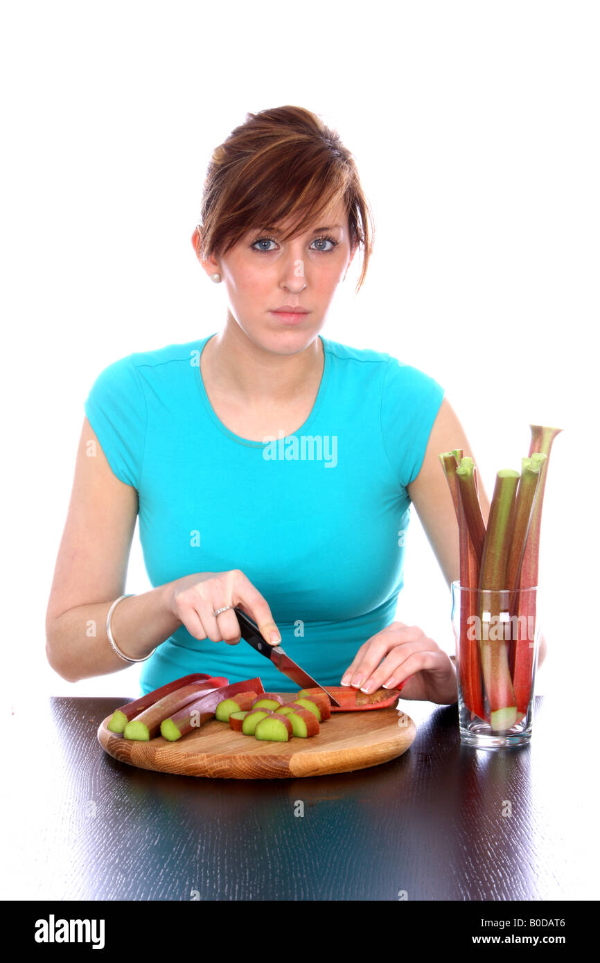 Teenage Girl Chopping Rhubarb Model Released Stock Photo - Alamy