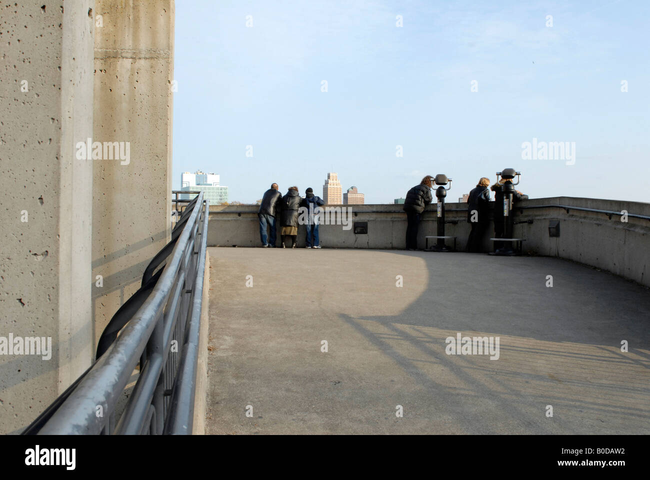 Tourists look across to the U.S border from the Canadian side of ...