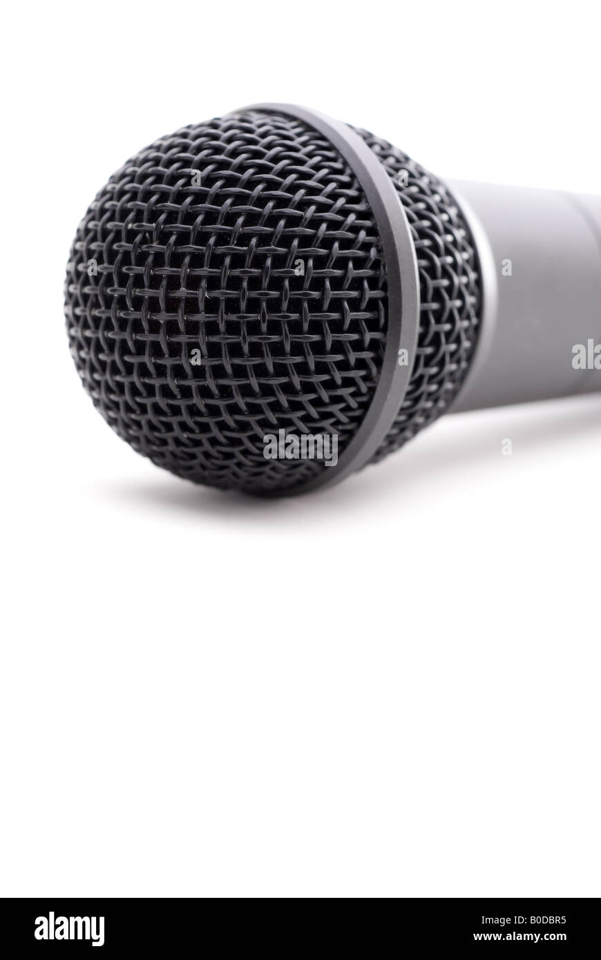 Closeup of a microphone on white Stock Photo - Alamy