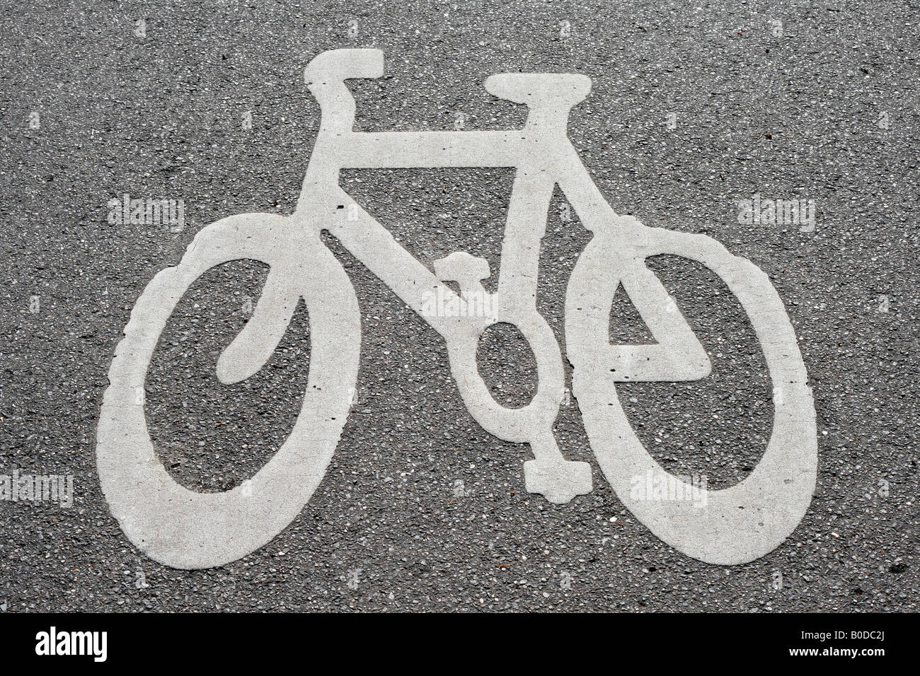 Bicycle sign on ground Stock Photo - Alamy