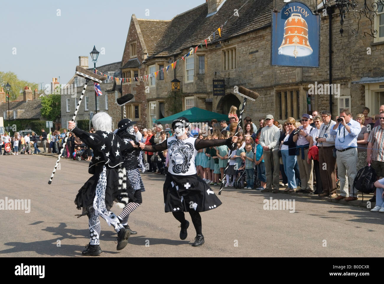 Stilton village, high street closed Pig Dykes Molly, Morris dancers ...