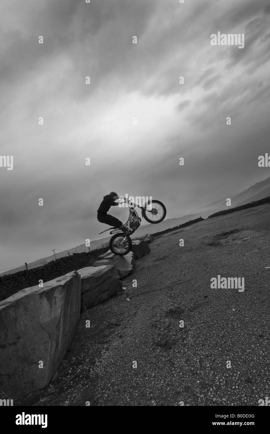 Scrambler bike jump Stock Photo - Alamy