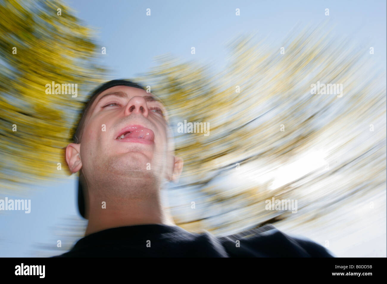 Boy turn around in a forest Stock Photo - Alamy