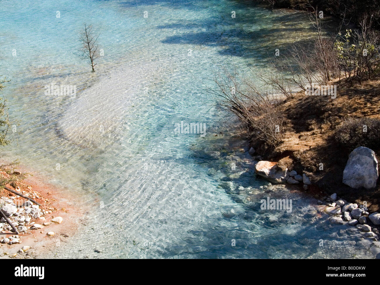 Clear blue water of the Jade Water Lake at Ganhaizi around Lijiang ...