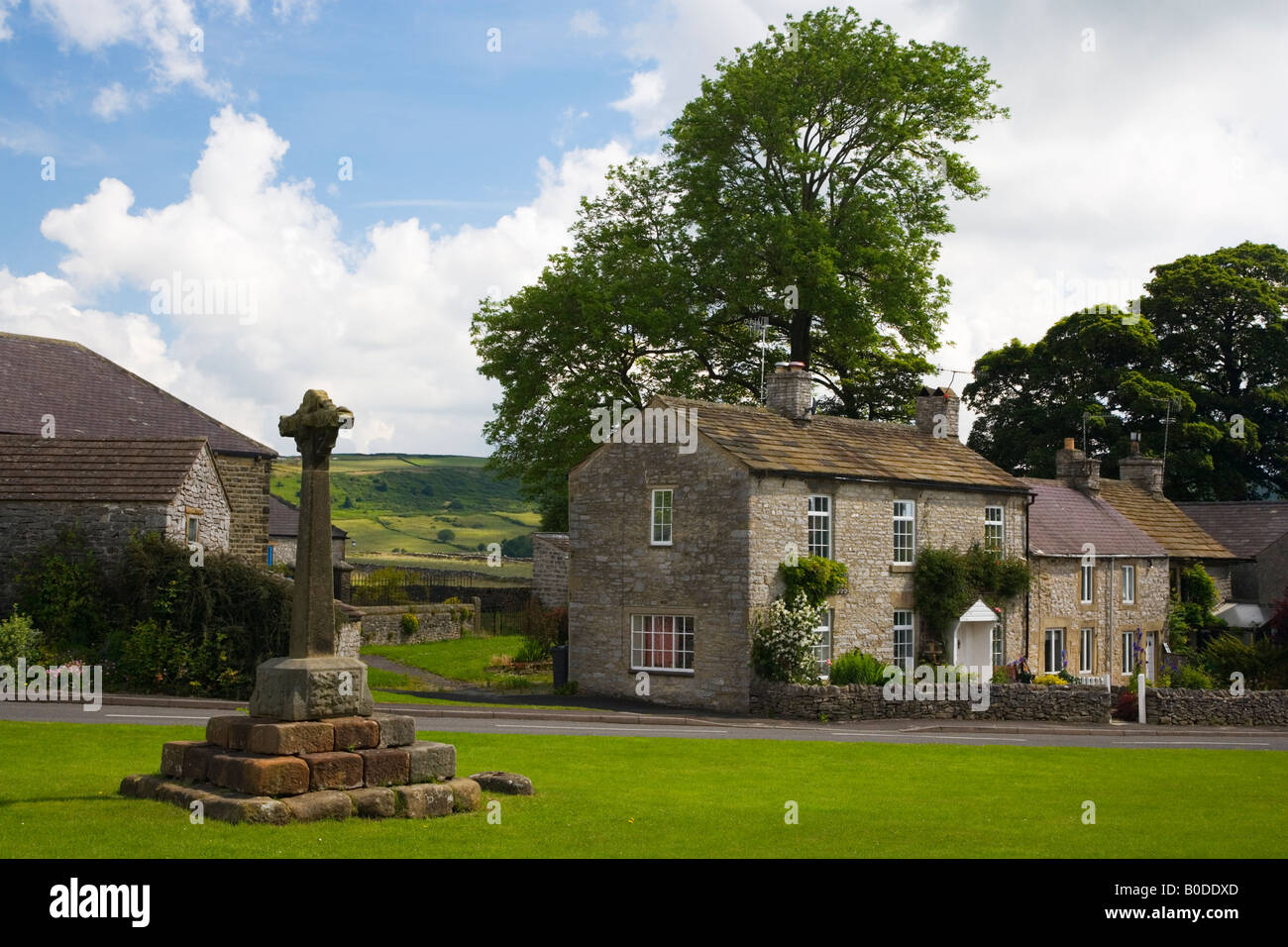 14th Century Cross on the village green in Foolow in the Peak District ...